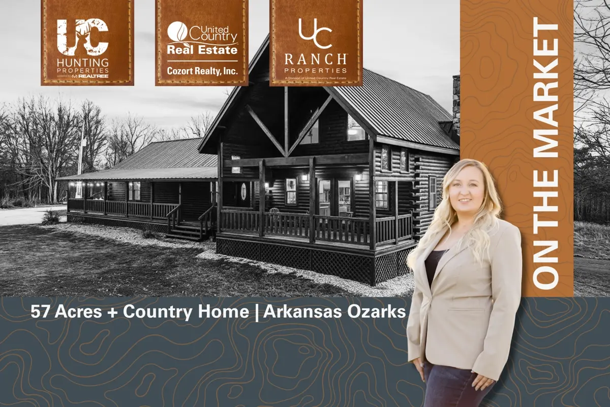 Custom Built Log Cabin and 57 Wooded Acres in Thayer MO